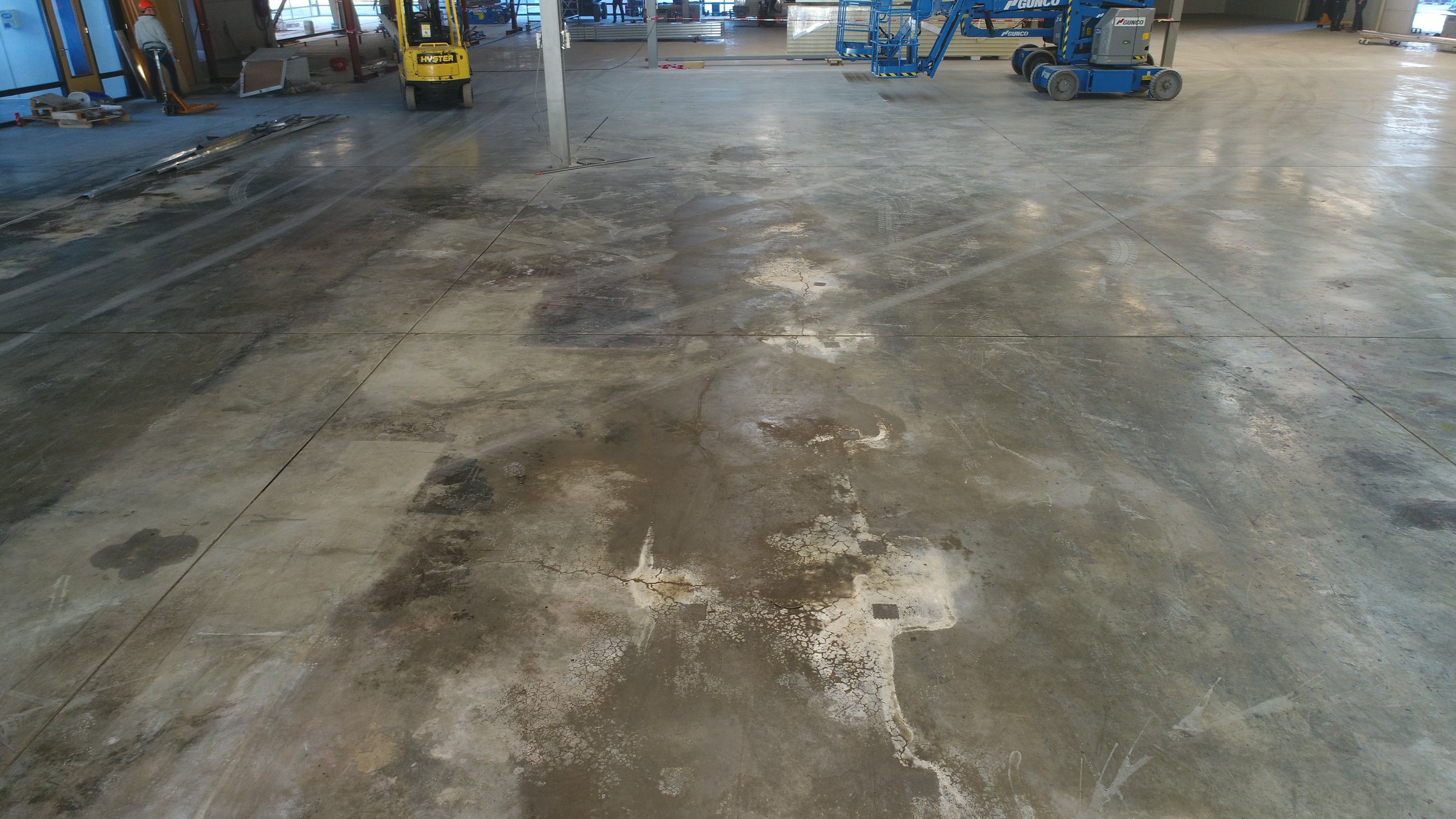 Removing stains from concrete floors